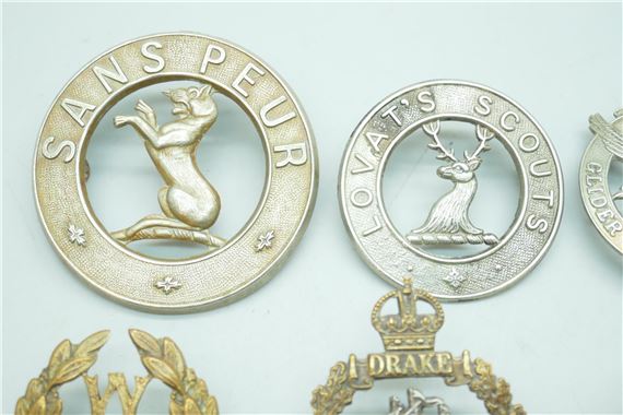 Drake | Seven military cap badges | MutualArt