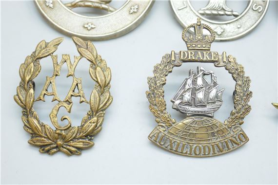 Drake | Seven military cap badges | MutualArt