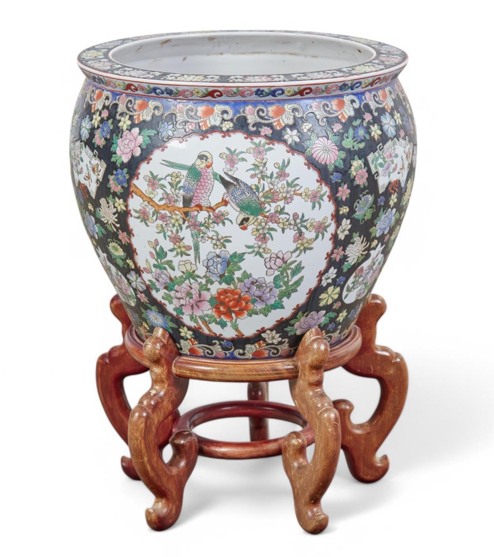 Rubbing | A pair of Chinese Famille Noir porcelain jardinieres | MutualArt