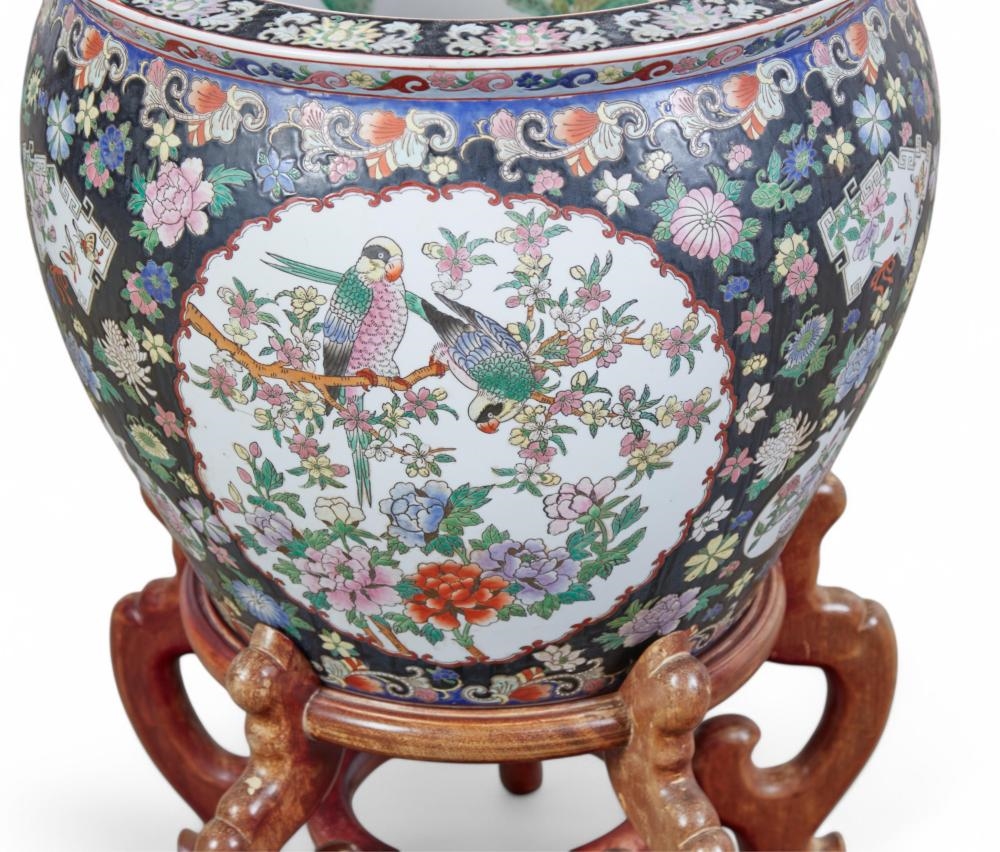 Rubbing | A pair of Chinese Famille Noir porcelain jardinieres | MutualArt