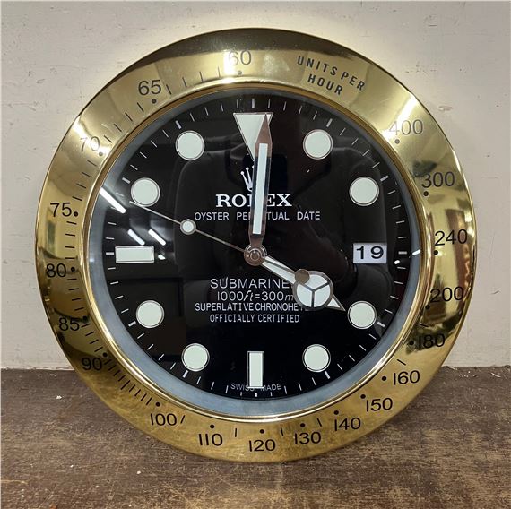 Rolex | A Rolex style dealers display circular wall clock | MutualArt