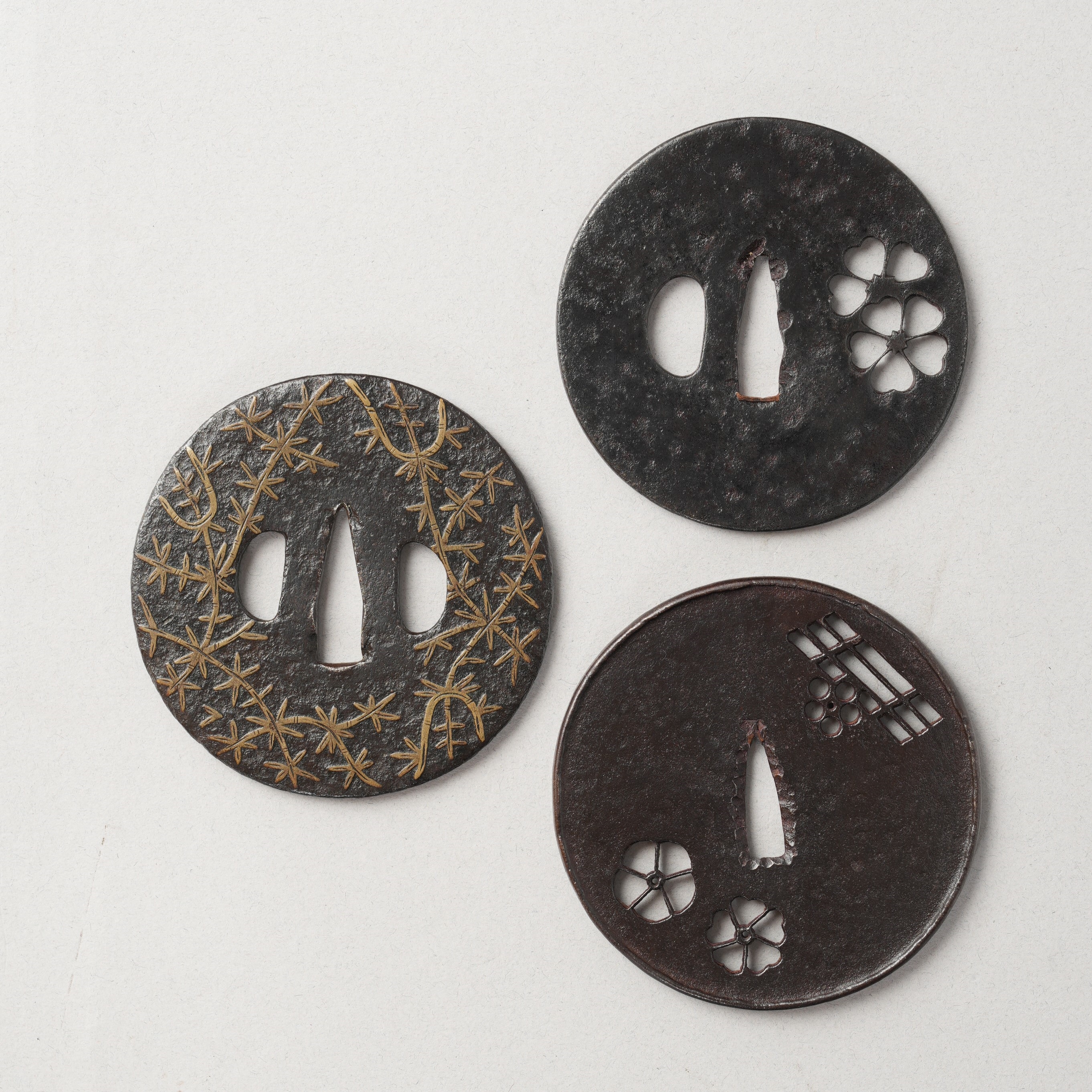 Japanese School | THREE JAPANESE IRON TSUBA | MutualArt
