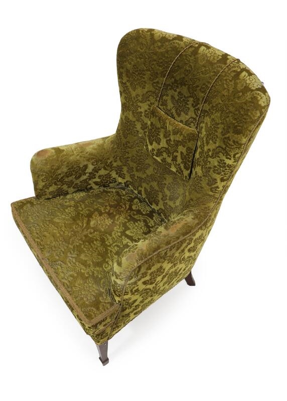 Frits Henningsen | A mahogany frame wingback chair upholstered with ...