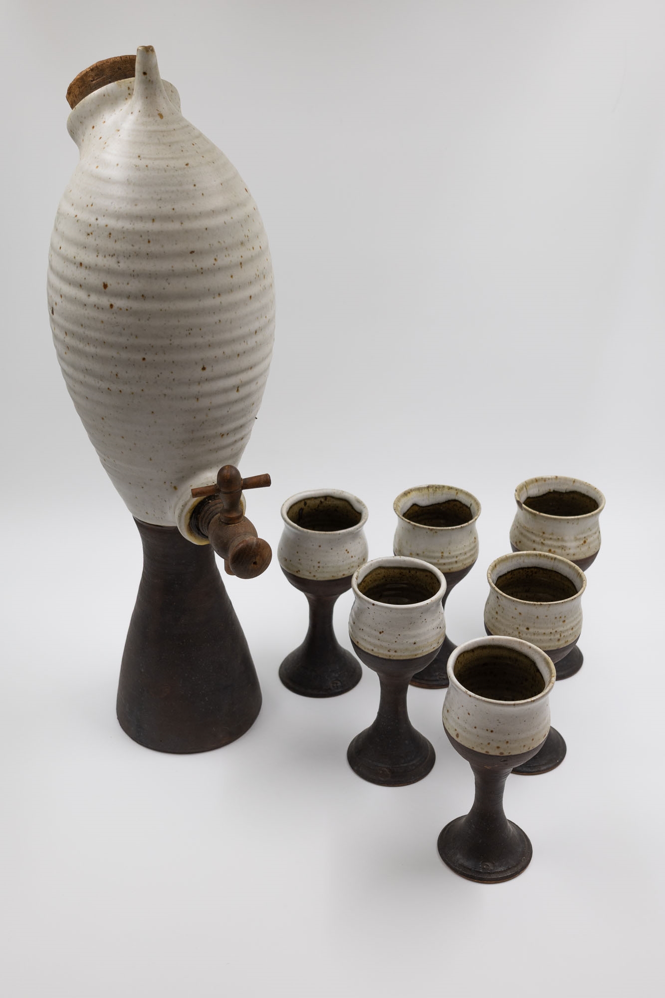 Ian Firth | the bottle with wooden tap and cork lid (one goblet chipped ...