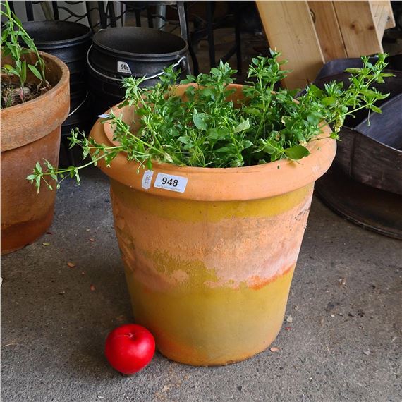 Planter | A good sized terracotta garden planter with sun face motif ...