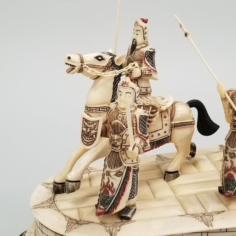 Chinese School | Lg ornately carved bone sculpture of a Chinese | MutualArt