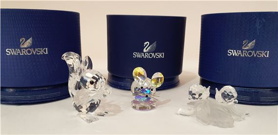 Swarovski | THREE MINIATURE SWAROVSKI CRYSTAL ANIMAL MODELS | MutualArt