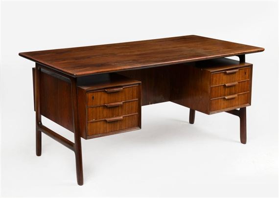 Gunni Omann | A Gunni Omann rosewood desk manufactured by Omann Jun ...