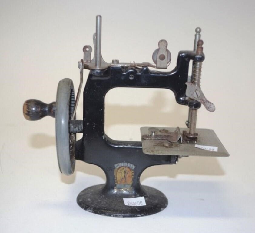 Peter Pan | Peter Pan hand operated toy sewing machine | MutualArt