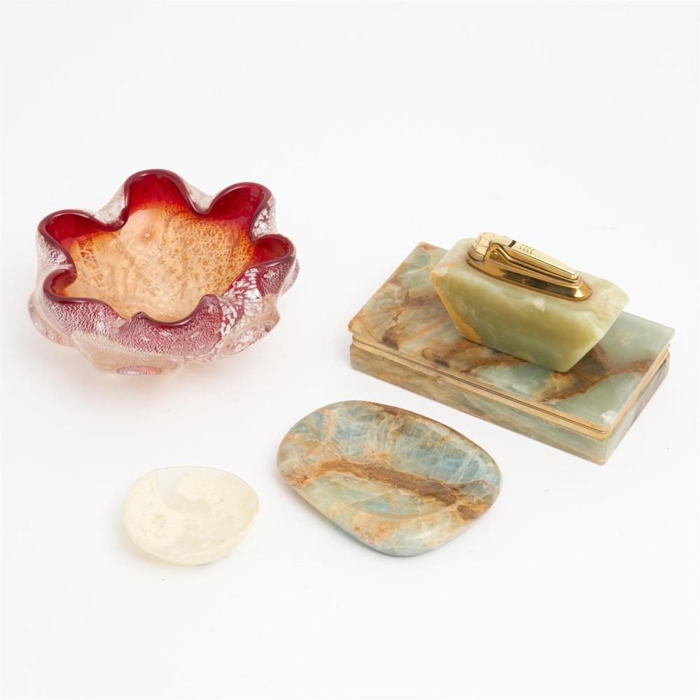 Dinosaur Designs | A COLLECTION OF DESK ITEMS INCLUDING A CARVED VERTE ...