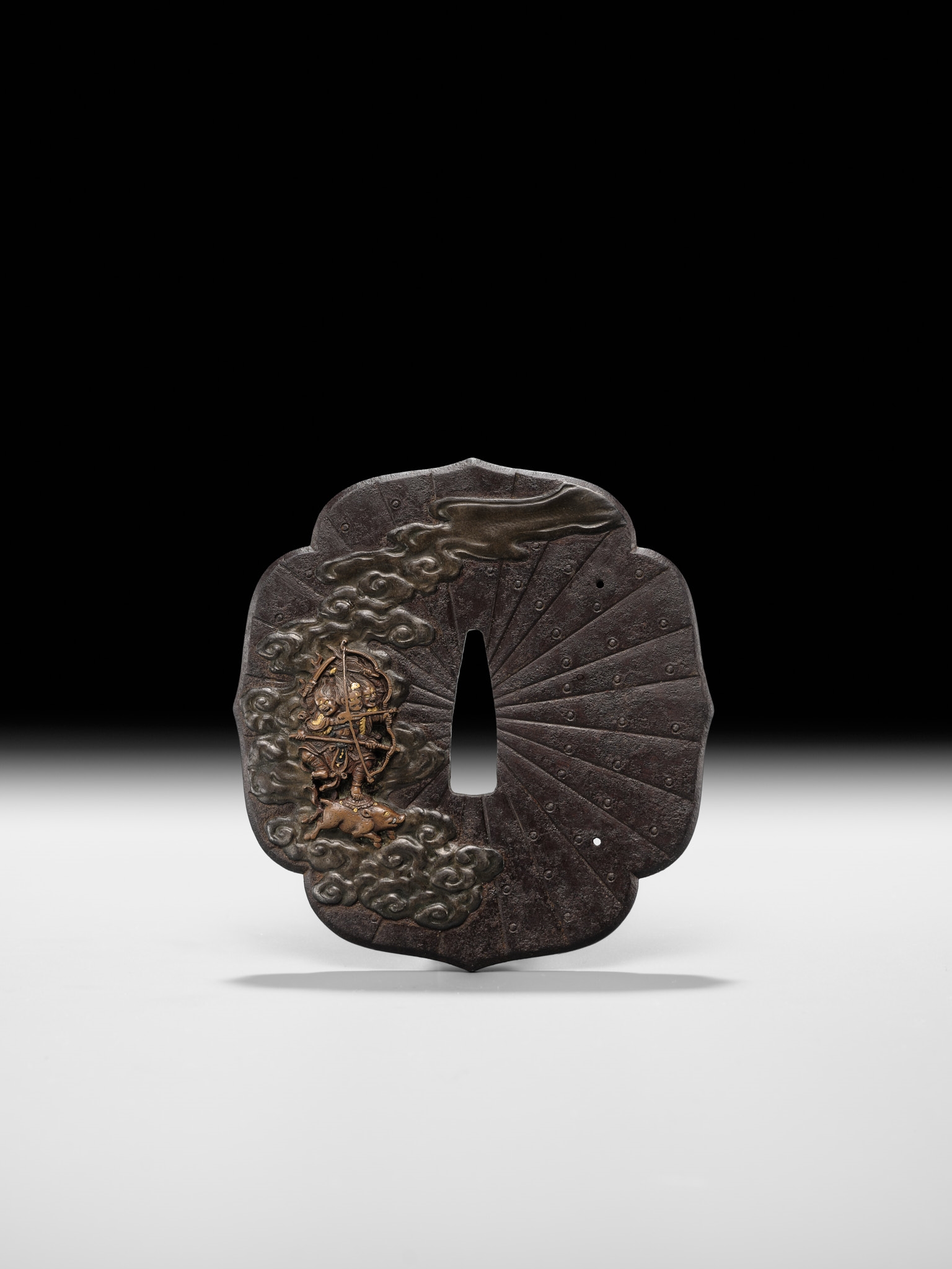 Hamano Shozui | A RARE HAMANO SCHOOL IRON TSUBA WITH MARISHI-TEN RIDING ...