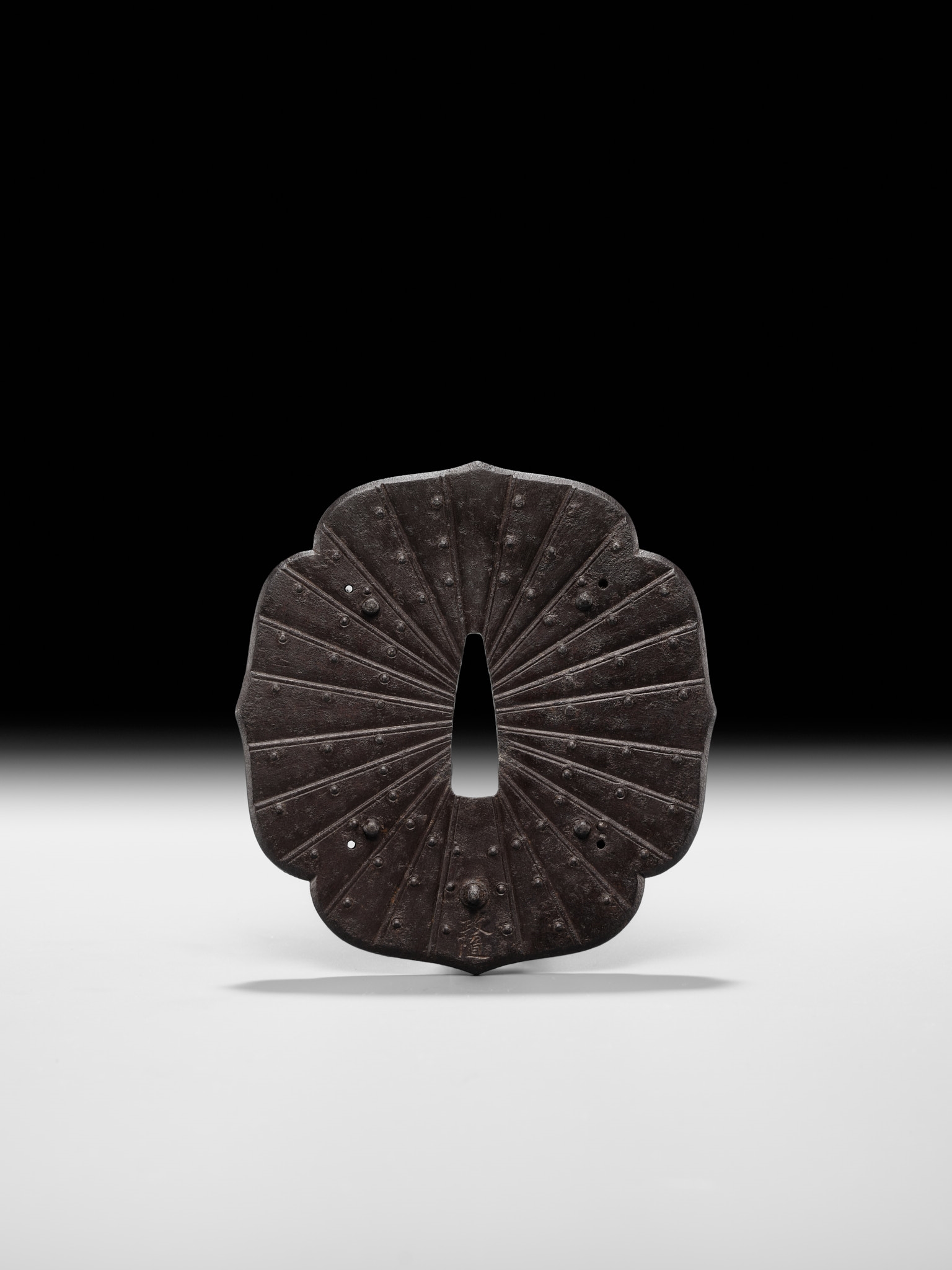 Hamano Shozui | A RARE HAMANO SCHOOL IRON TSUBA WITH MARISHI-TEN RIDING ...