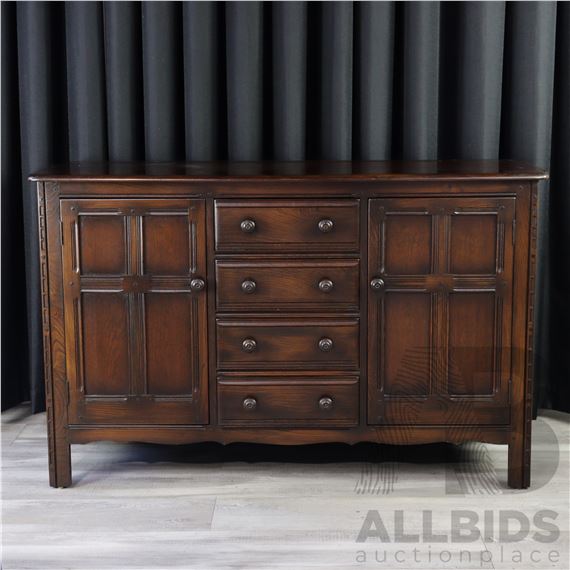 Ercol | Ercol Oak Four Drawer Sideboard with Two Doors | MutualArt