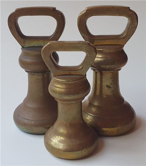 Avery | Three large brass bell weights | MutualArt