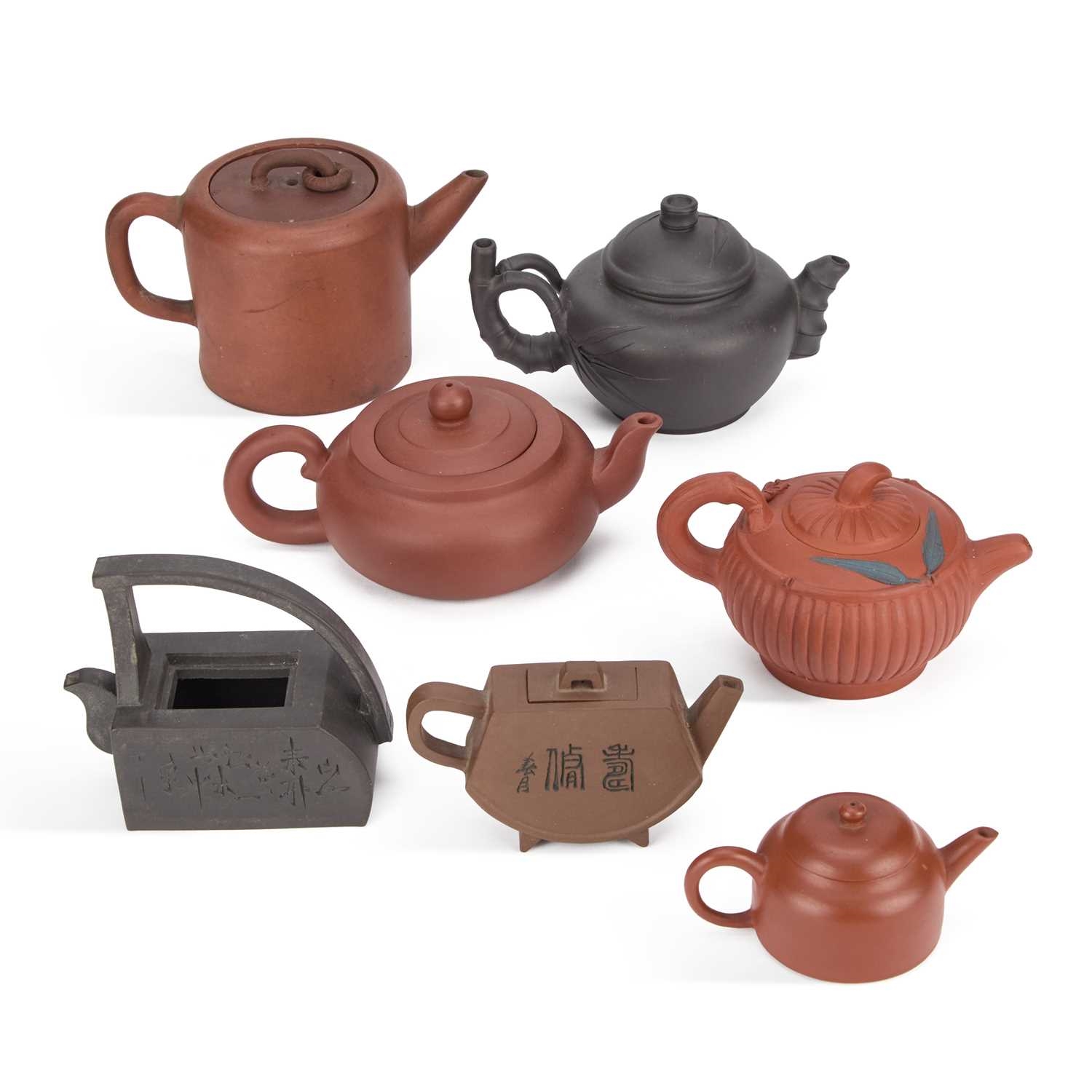 Group of Seven | A GROUP OF SEVEN CHINESE YIXING TEAPOTS | MutualArt