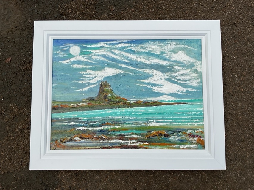 John Damari | view of Lindisfarne Castle with seagulls on a cloudy day ...