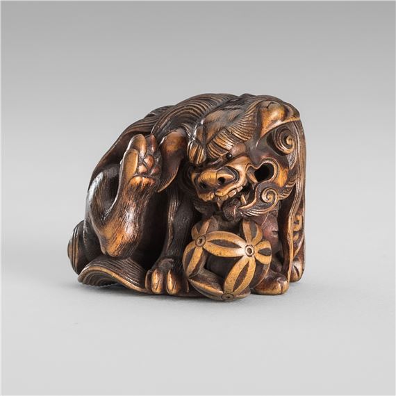Masamitsu | Netsuke of a Shishi with cub and ball (19th Century ...