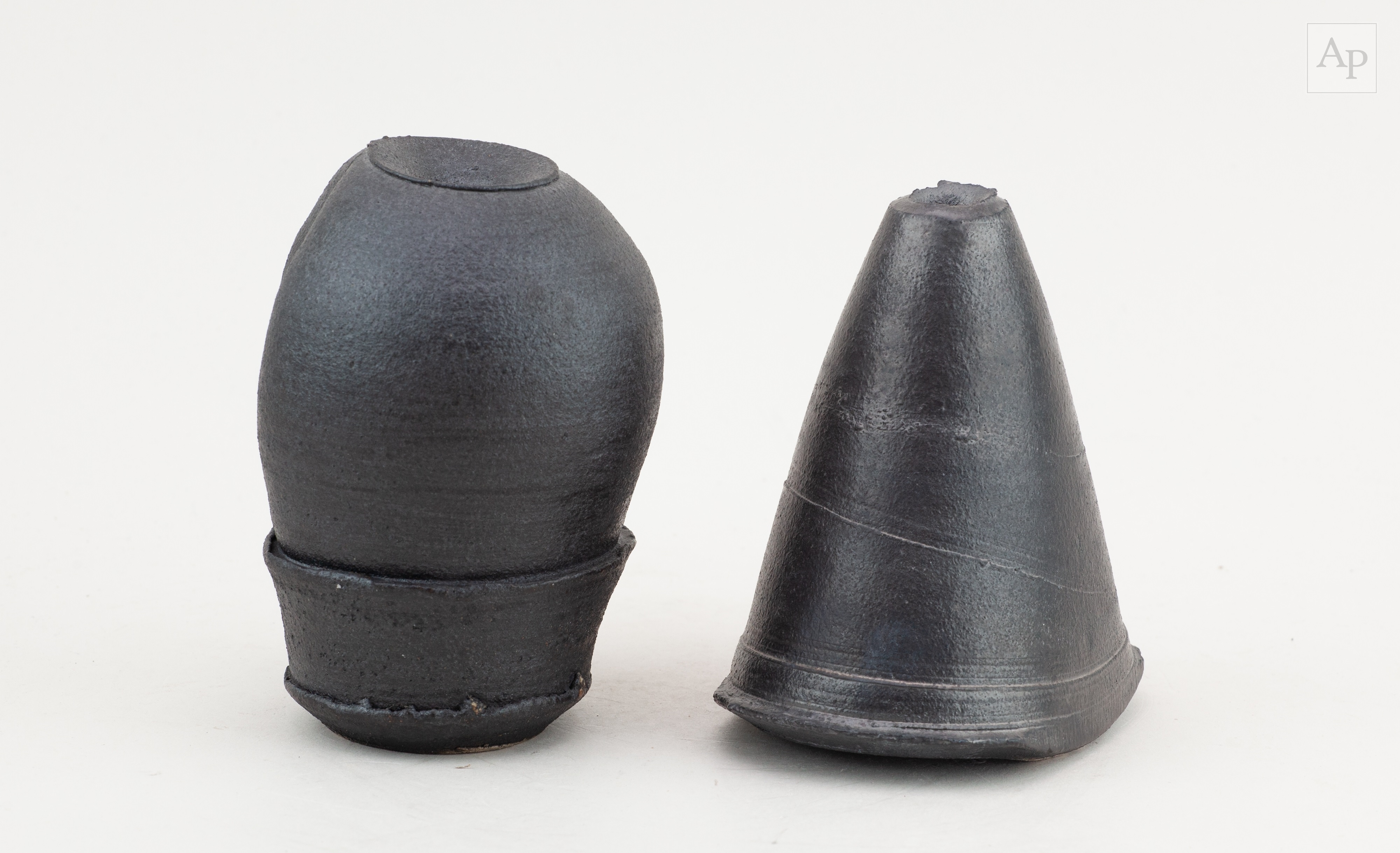 Dan Kelly | a conical stoneware vessel covered in black glaze | MutualArt