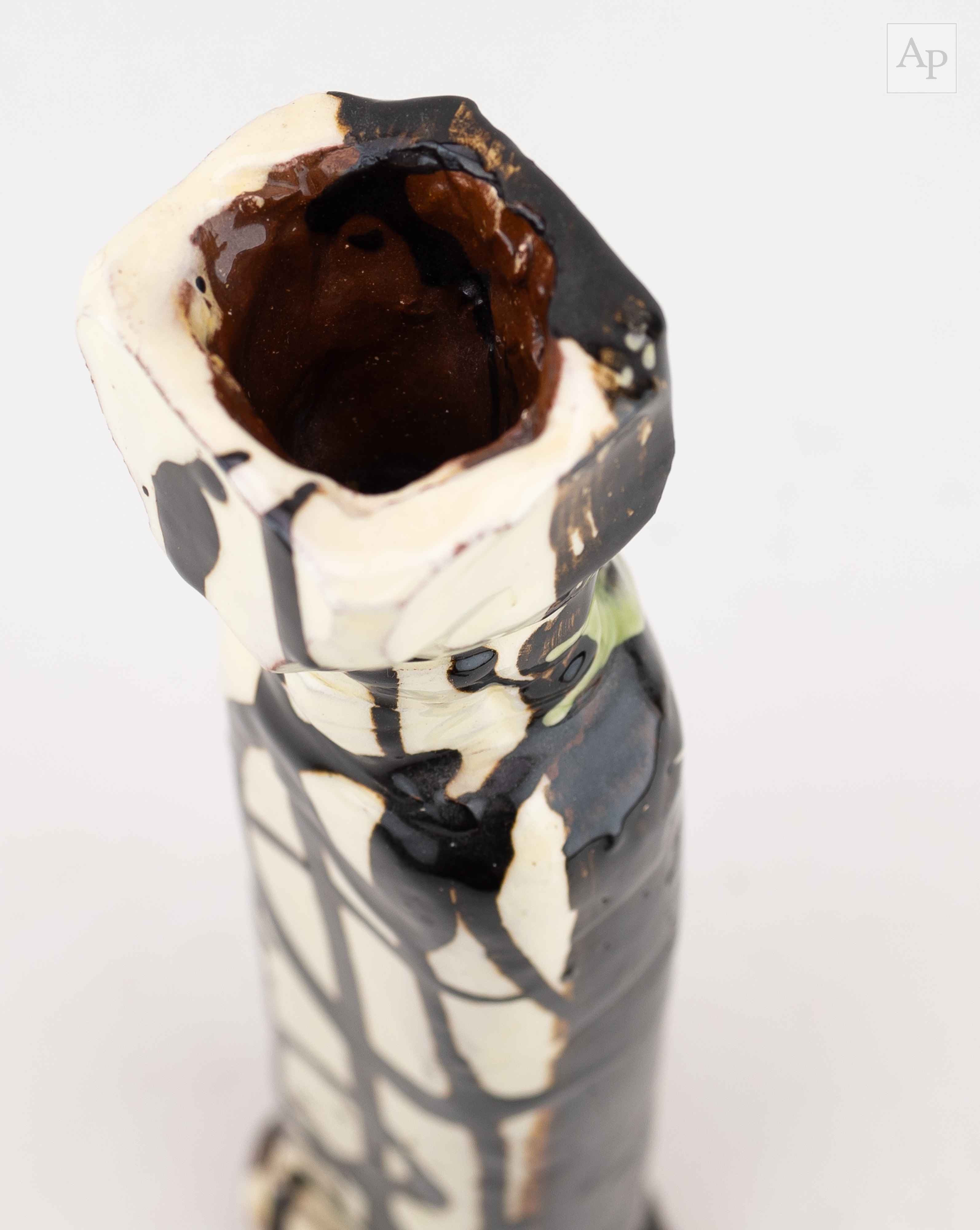 Dylan Bowen | a tall slender slip decorated earthenware bottle | MutualArt