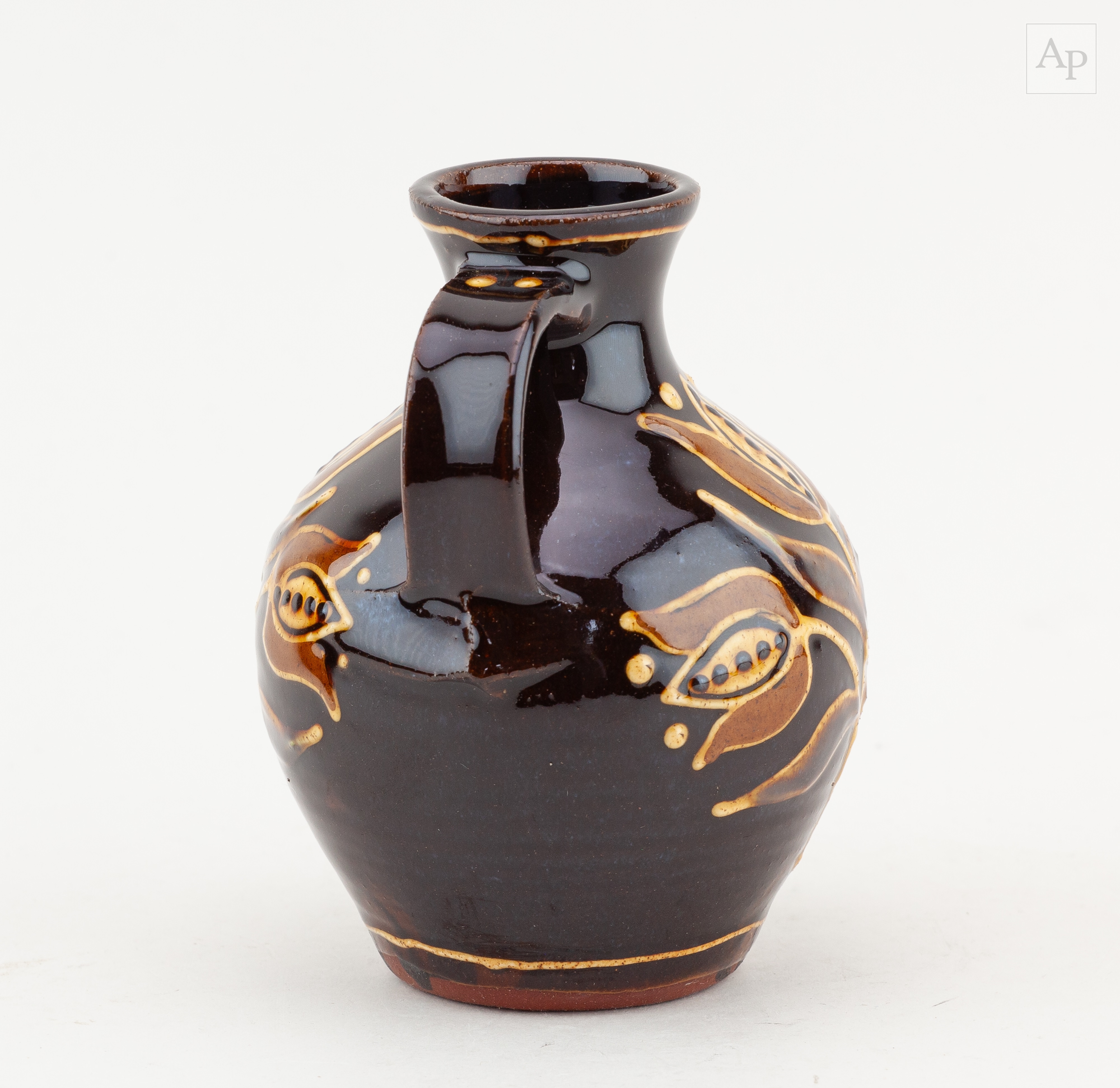 Hannah McAndrew | a slipware jug decorated with flowers | MutualArt