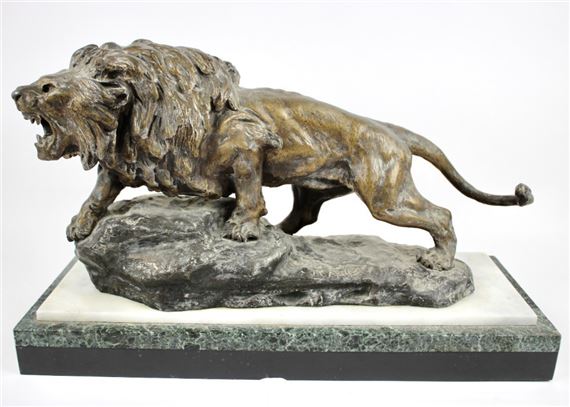 T. Cartier | A Large Decorative metal figure of a roaring Lion on a ...
