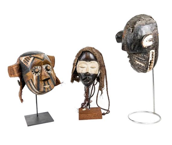 African School | 3 Carved & Painted African Masks on Stands | MutualArt