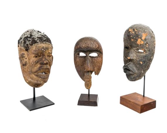 African School | Group of 3 Carved African Masks on Stands | MutualArt
