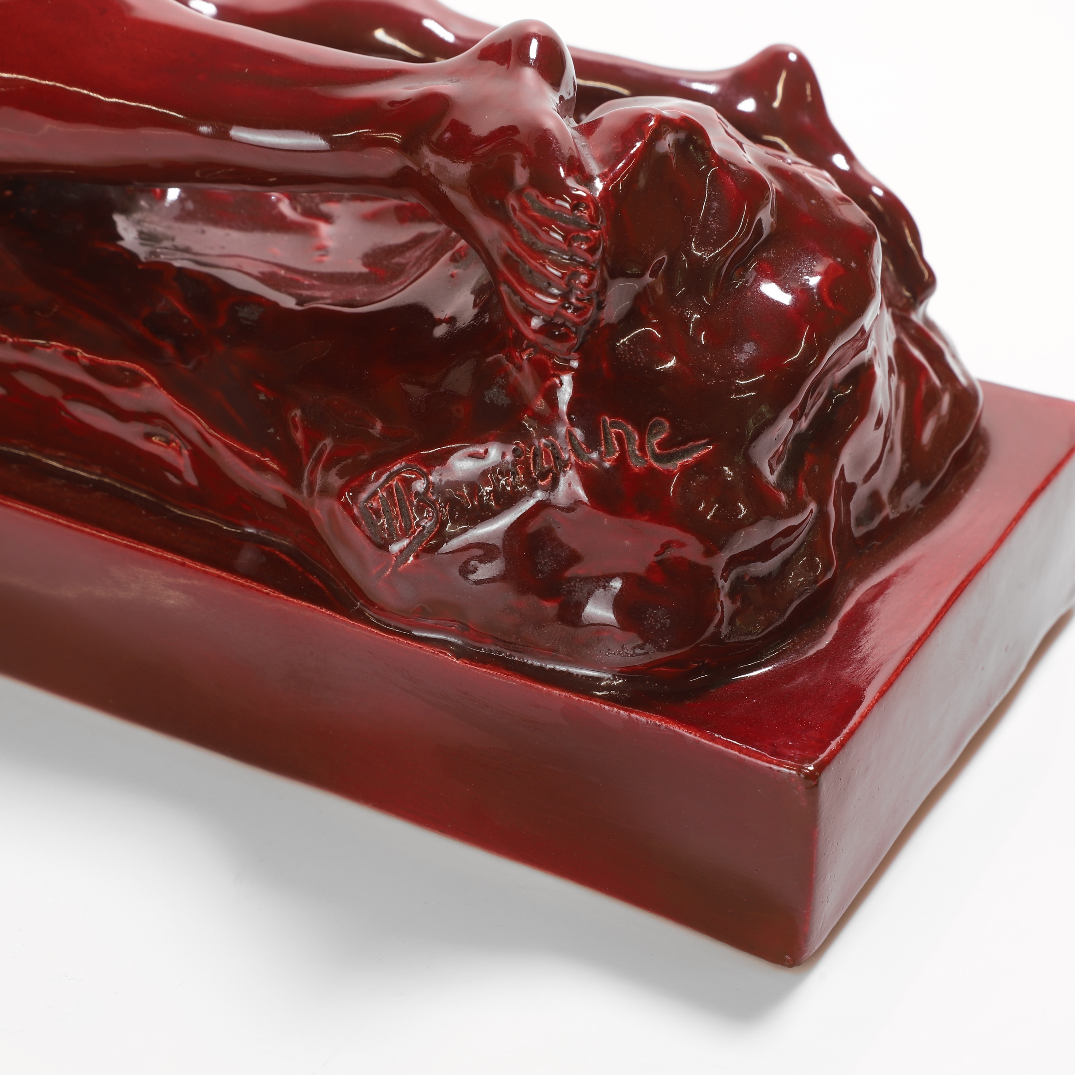 Marcel-André Bouraine | a rare French Art Deco red-glazed figure of a ...
