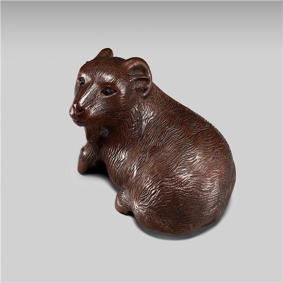 Masanao Shinzan | A FINE WOOD NETSUKE OF A RECUMBENT GOAT (1970 ...