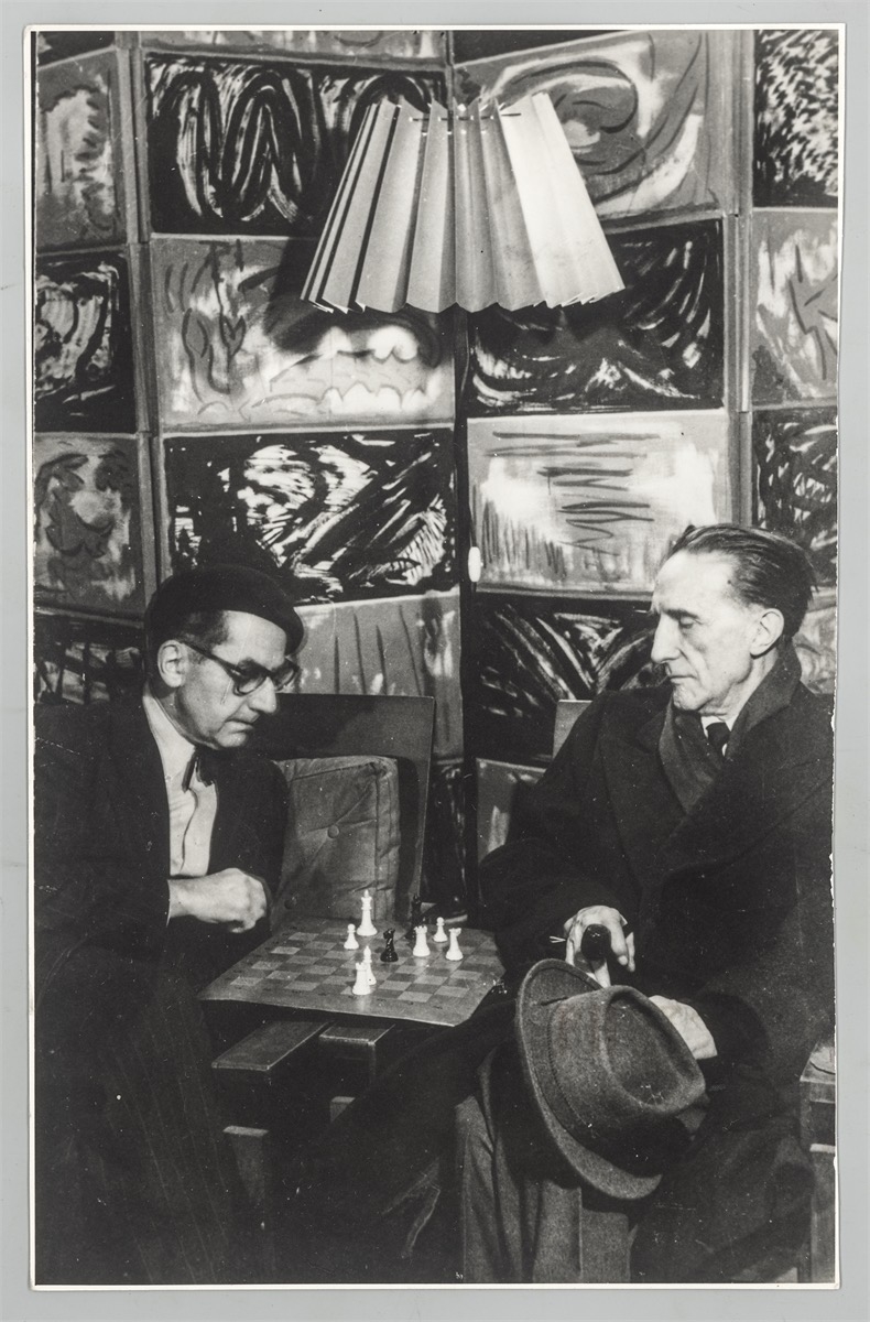 Man Ray | Man Ray and Marcel Duchamp playing chess in Man Ray's studio ...