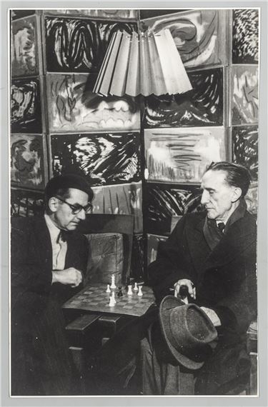 Man Ray | Man Ray and Marcel Duchamp playing chess in Man Ray's studio ...
