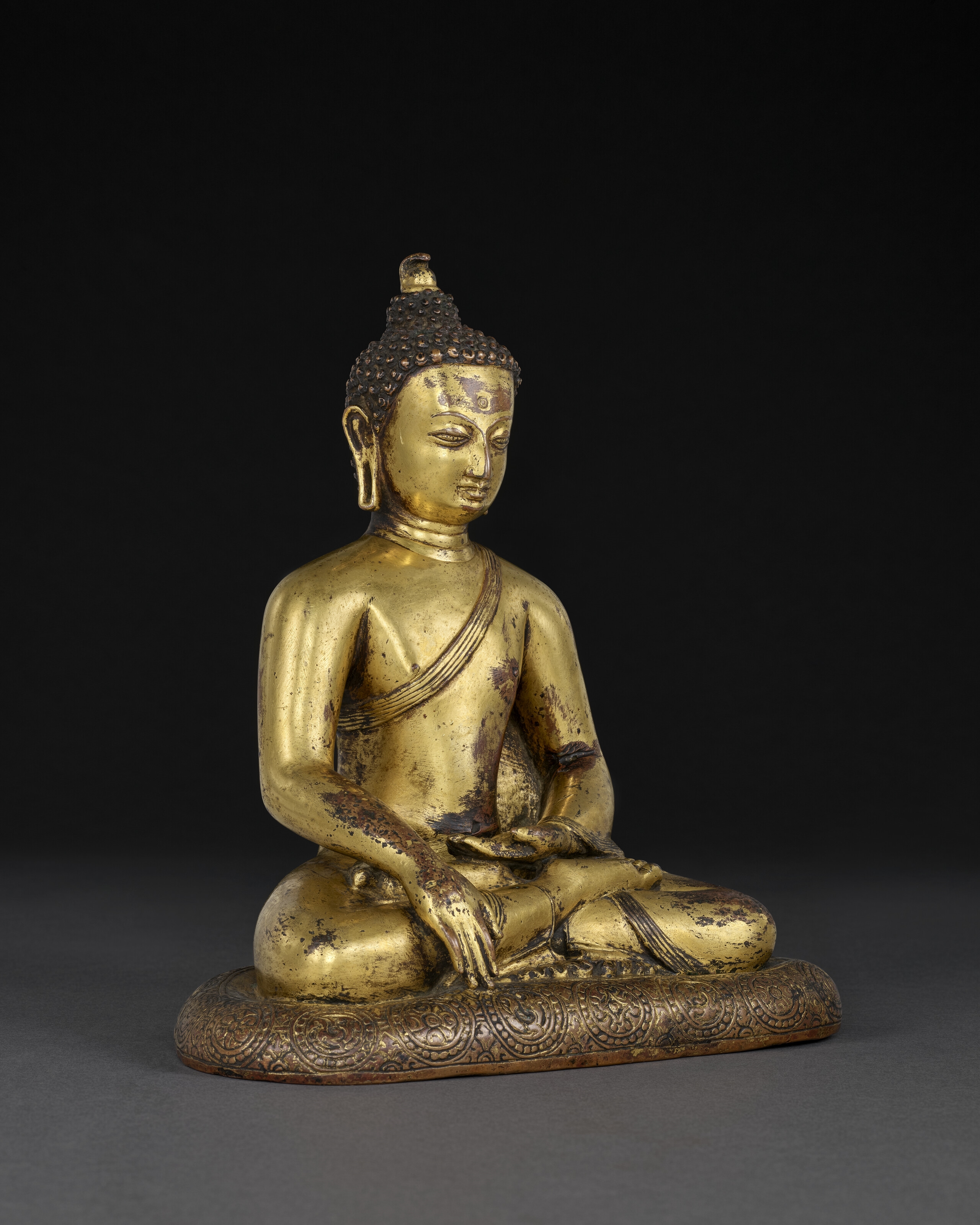 Nepalese School, 8th Century | A GILT COPPER FIGURE OF SHAKYAMUNI ...