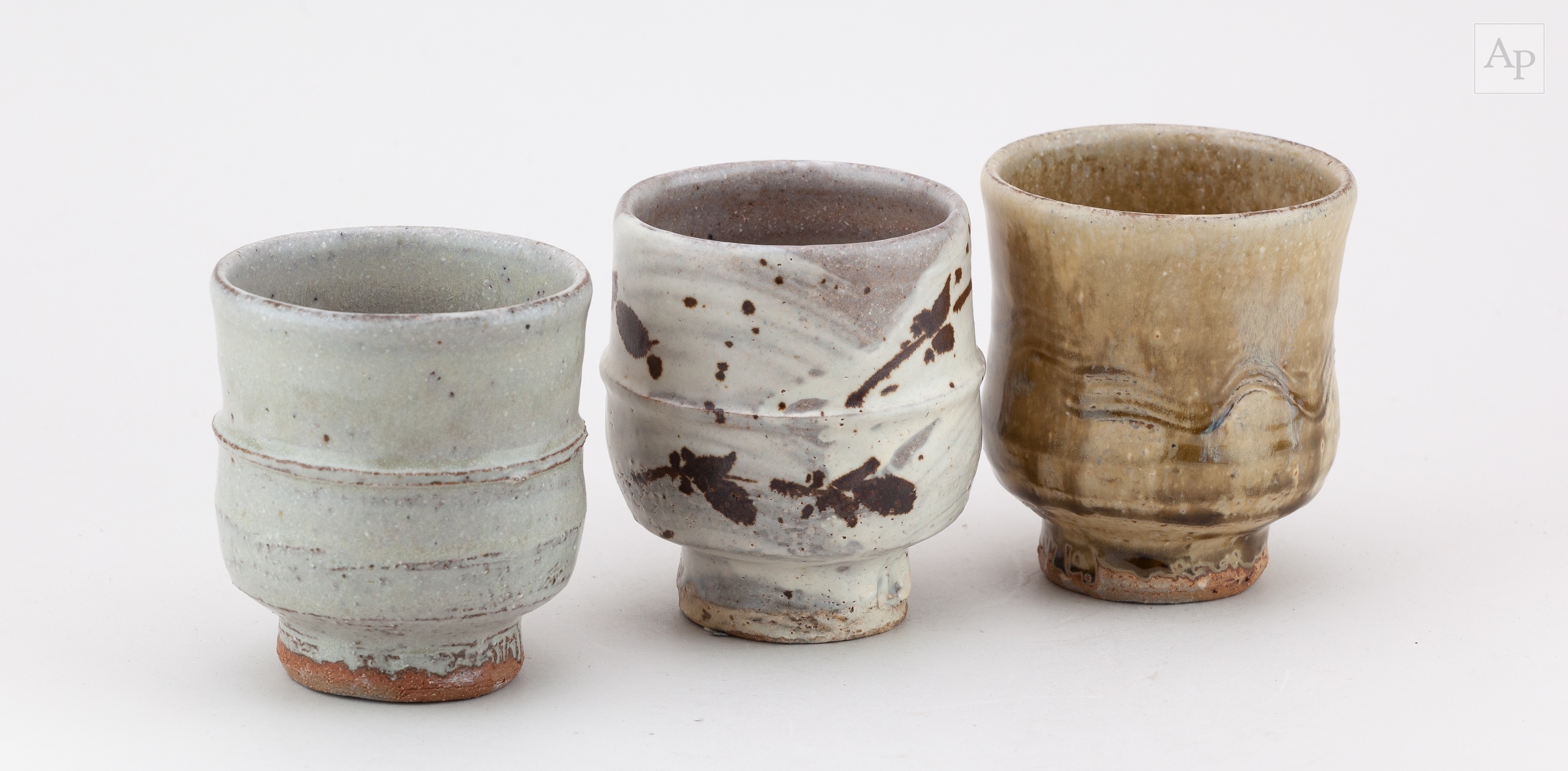 Jim Malone | a trio of stoneware yunomi covered in different glazes ...