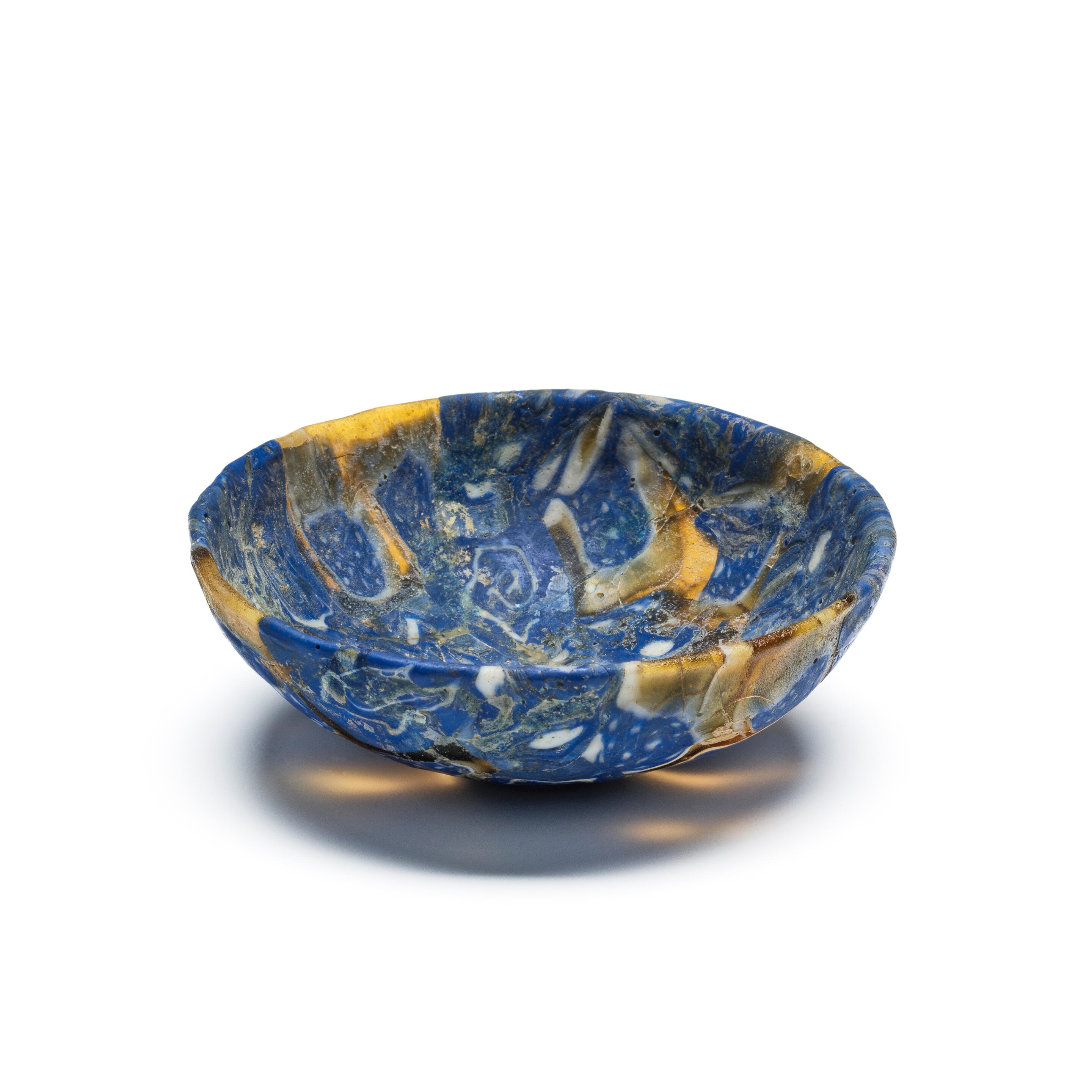 Roman School, 1st Century | A Roman shallow mosaic glass bowl of opaque blue, white and ...