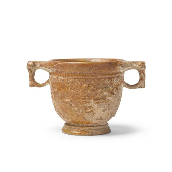 Roman School | A Roman yellow lead-glazed pottery skyphos with vine ...