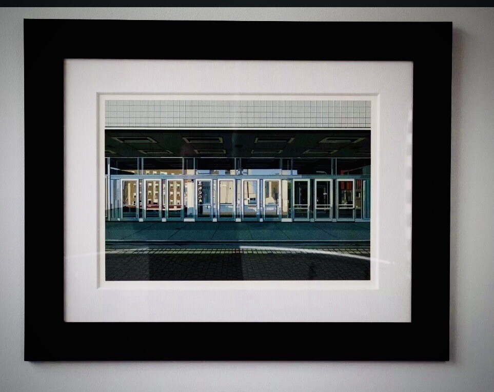 Richard Estes | Ten Doors (1972) | MutualArt