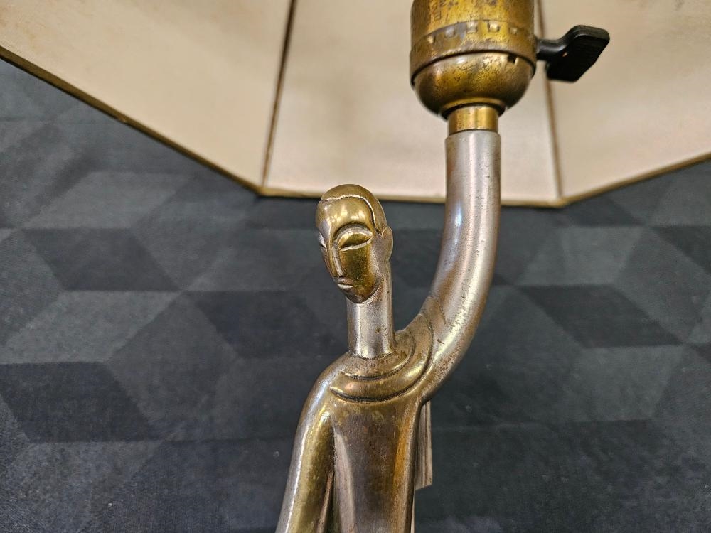 Hagenauer Werkstätte | silvered bronze figure of a kneeling male with ...