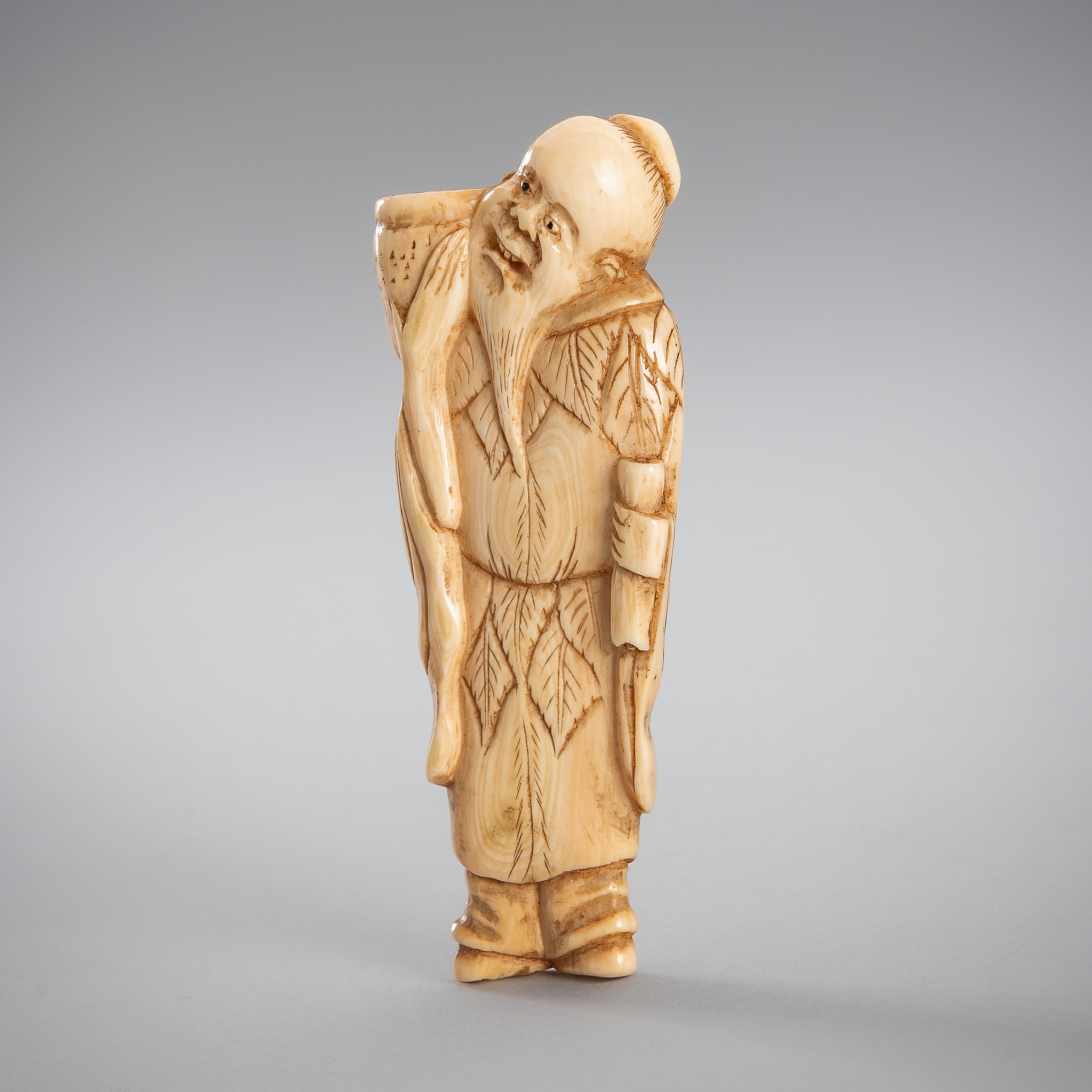 Japanese School, 18th Century | A FINE IVORY NETSUKE OF A SENNIN ...