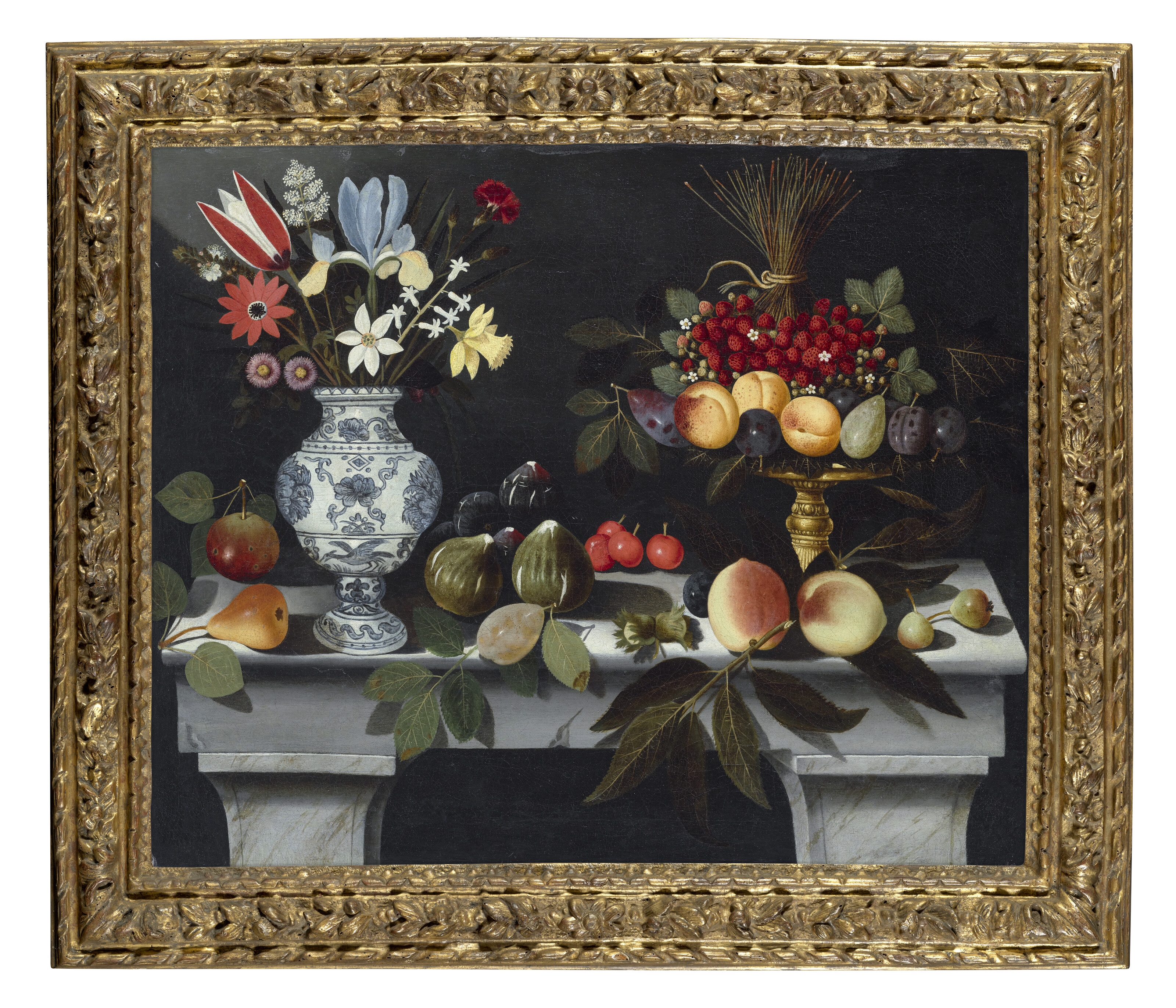 Cesare Dandini | A still life with a blue-and-white vase of flowers, a ...