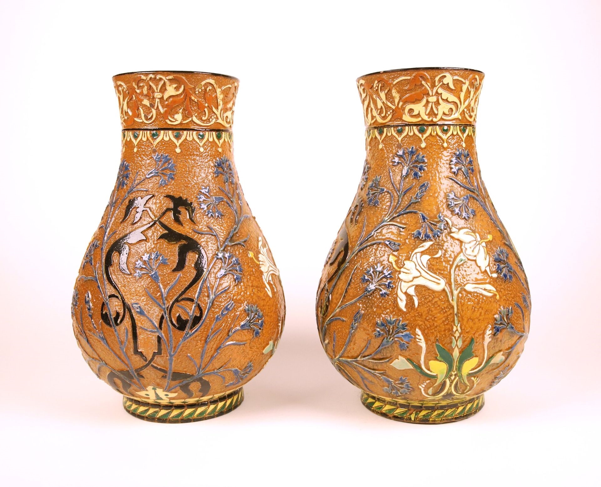 Louis-Robert Carrier-Belleuse | Pair of barbotine vases with flowers in ...