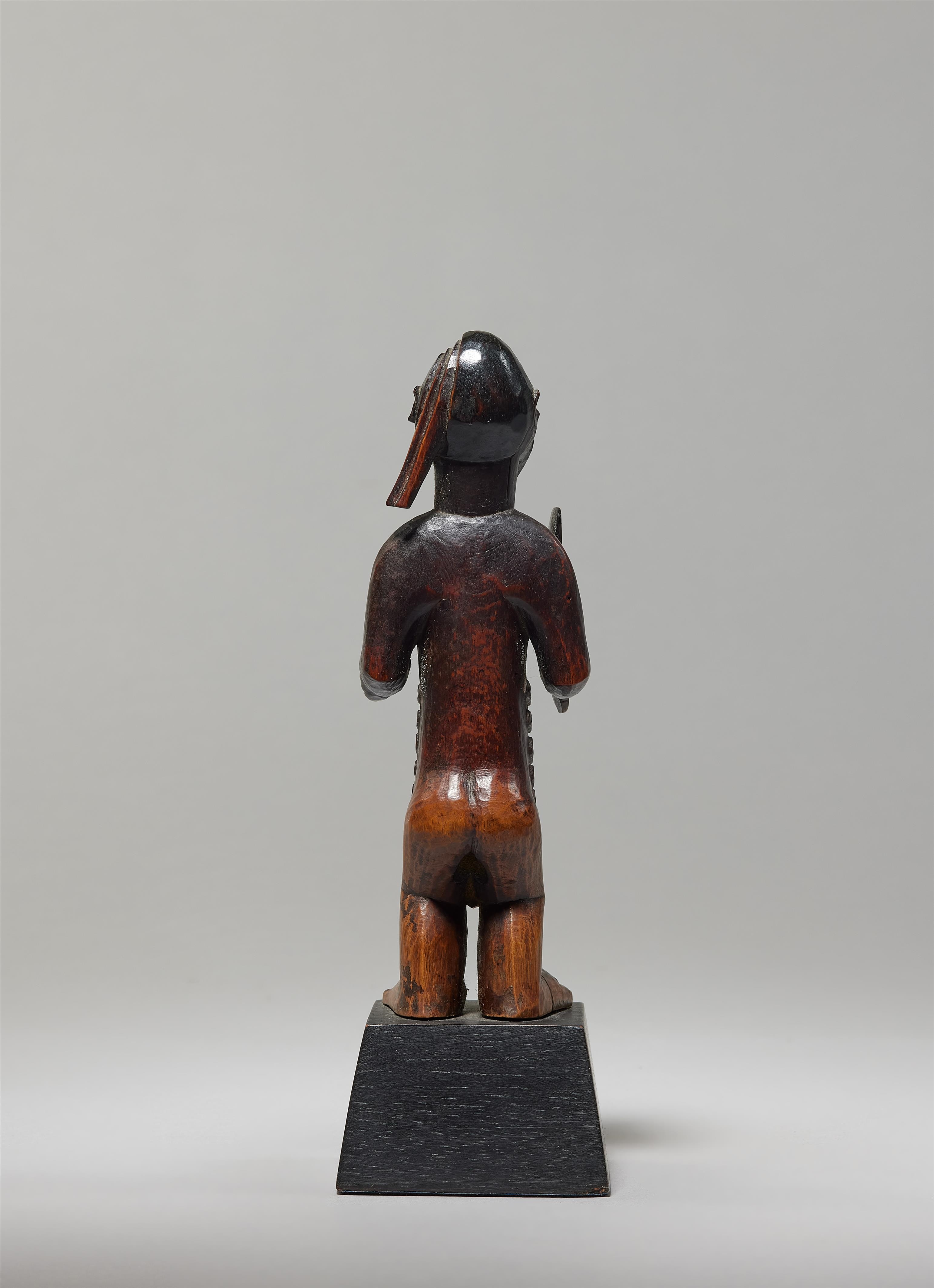 Congolese School | A fine Bembe figure | MutualArt