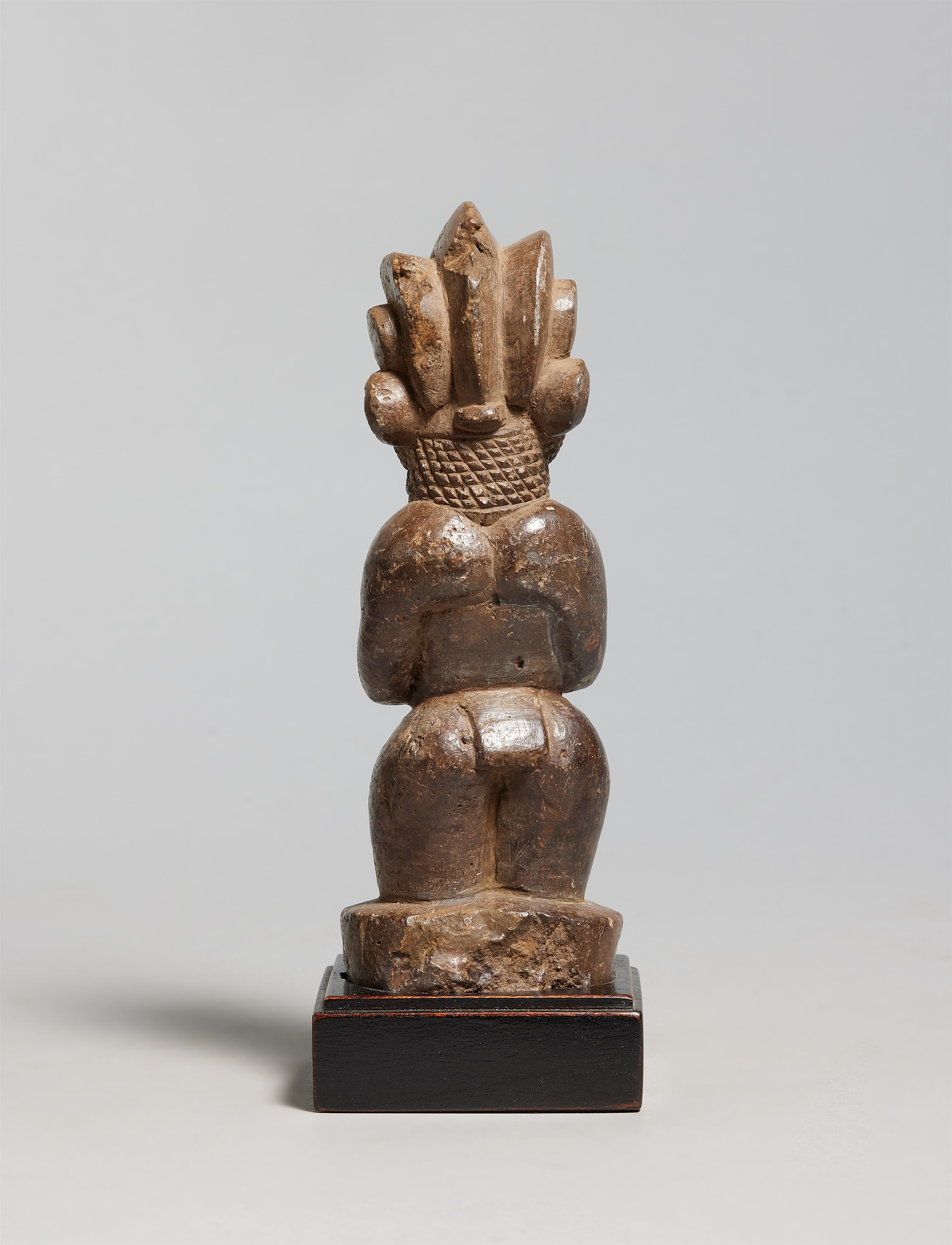 Sierra Leone School | A Sapi figure | MutualArt