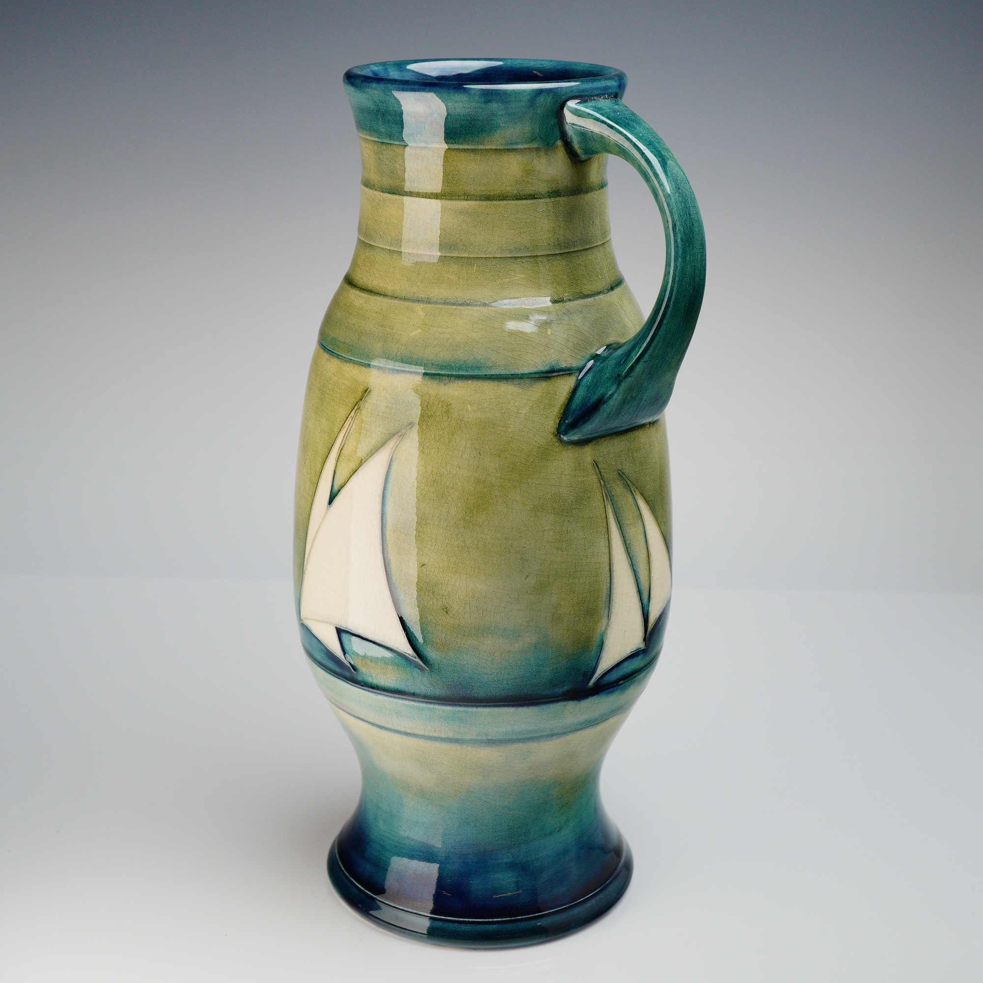 William Moorcroft | William Moorcroft High Glaze Yacht Pitcher | MutualArt