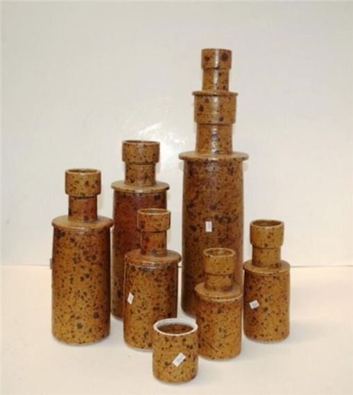 Col Levy | 7 graduated Australian pottery canisters | MutualArt