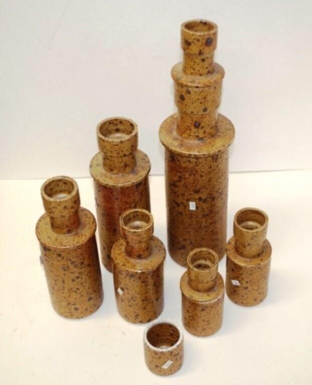 Col Levy | 7 graduated Australian pottery canisters | MutualArt