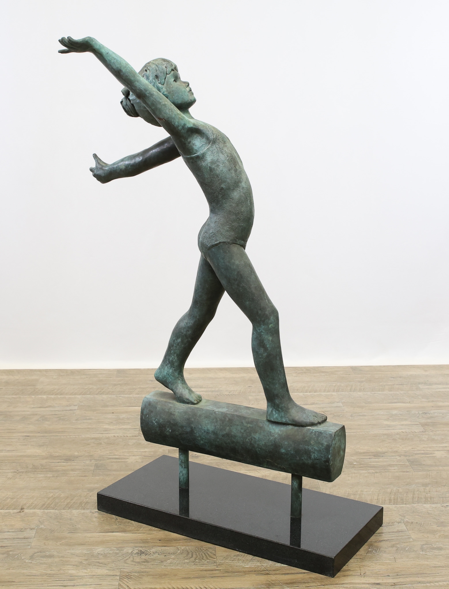 Elsa Martinus | figural sculpture of a child on a balance beam | MutualArt