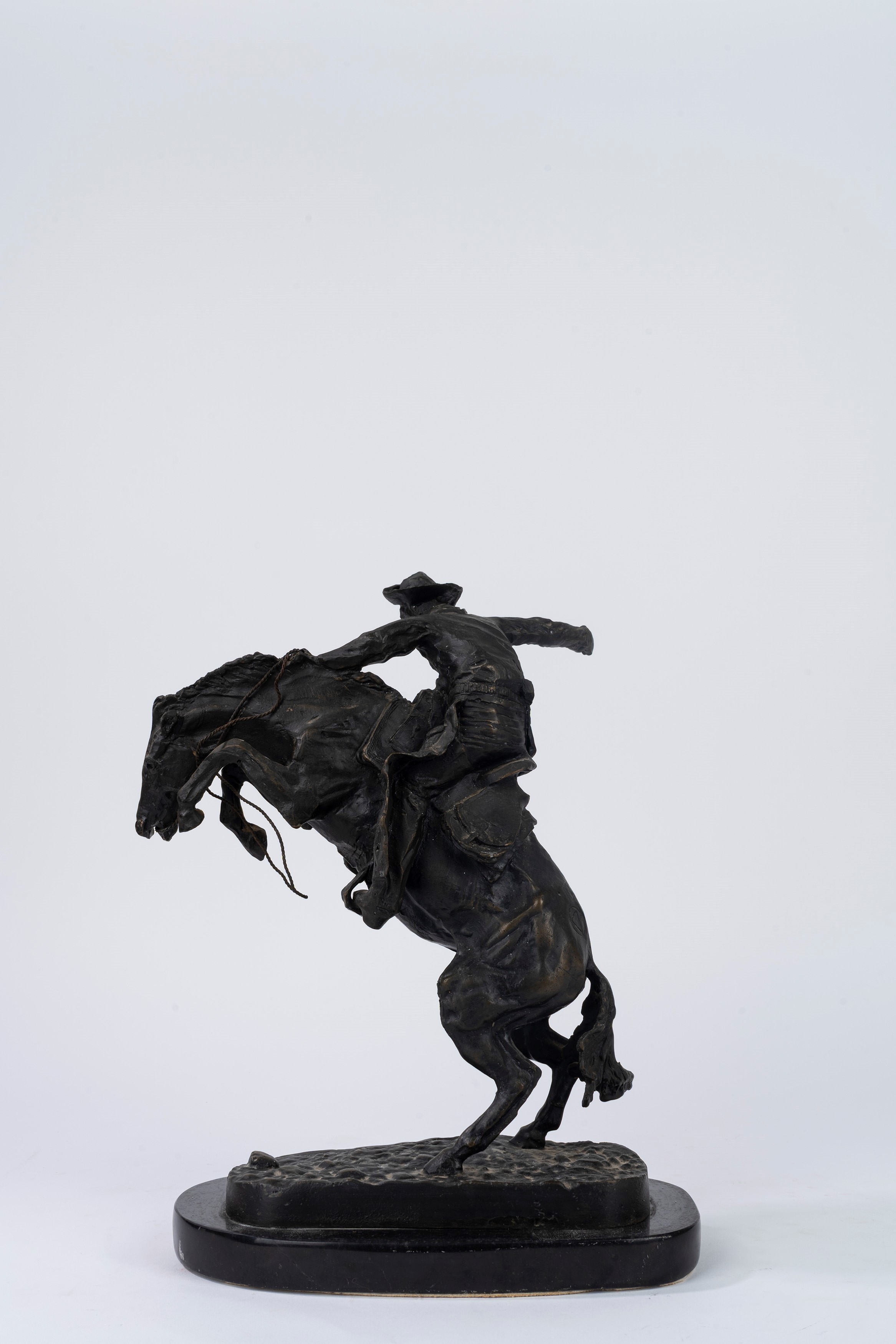 Frederic Remington | Bronco Buster | MutualArt
