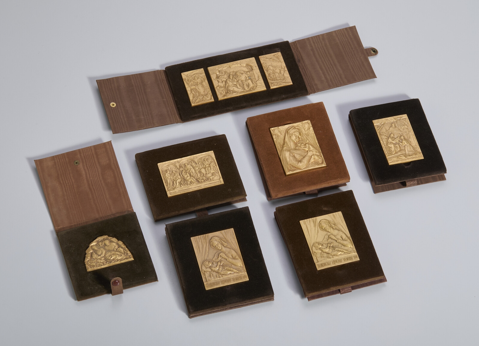 Enrico Manfrini | LOT COMPOSED OF 7 BAS-RELIEFS MADONNA AND CHILD ...