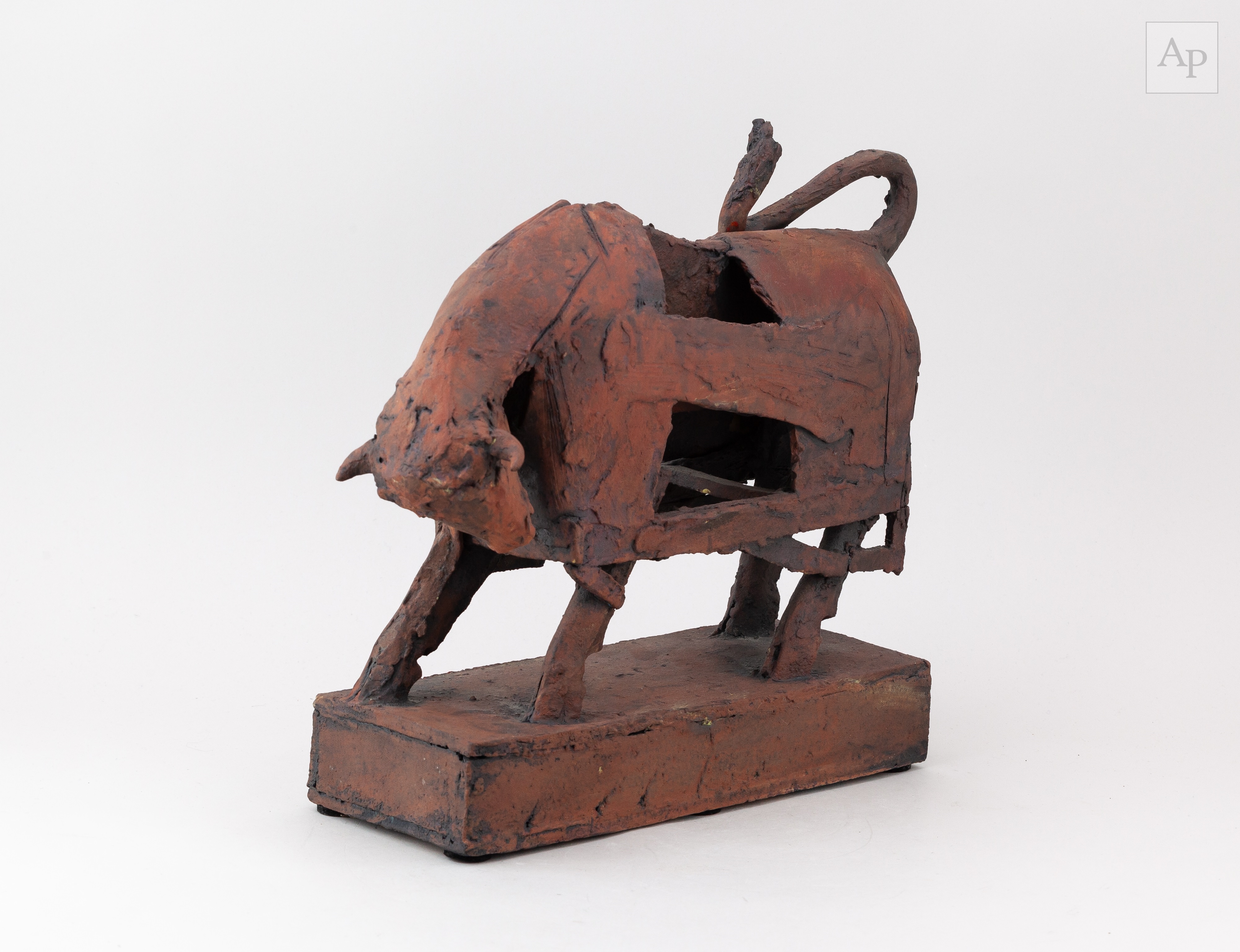 Christy Keeney | an earthenware sculpture of a bull on a rectangular ...