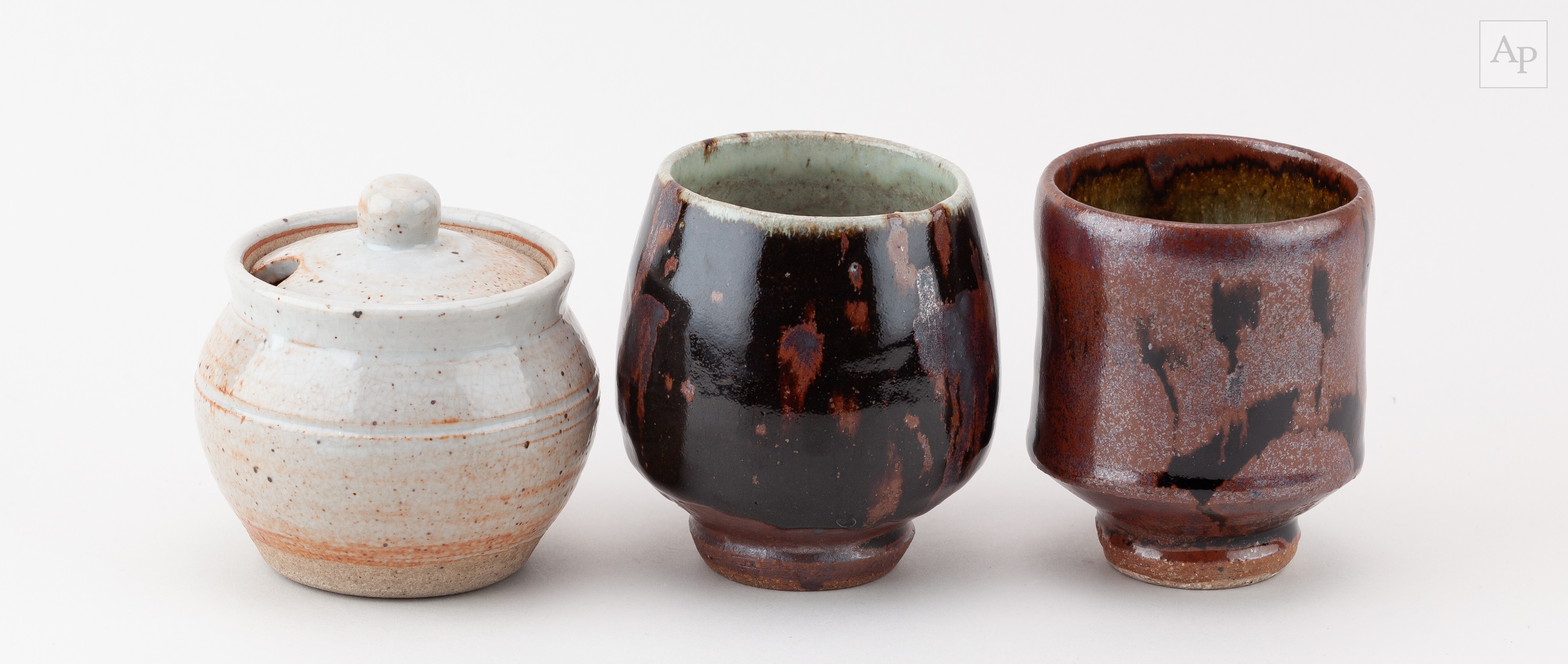 Phil Rogers | two stoneware yunomi covered in tenmoku and kaki glaze ...